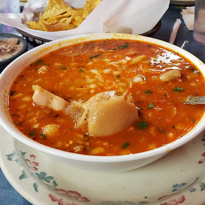 This menudo isn't just soup &ndash; it's a restorative potion, simmering with traditions and possibly magical properties for Sunday mornings.