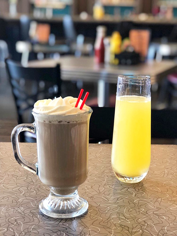 Breakfast mimosas and whipped-cream topped coffee &ndash; because sometimes adulting requires both caffeine and champagne to face the world properly.