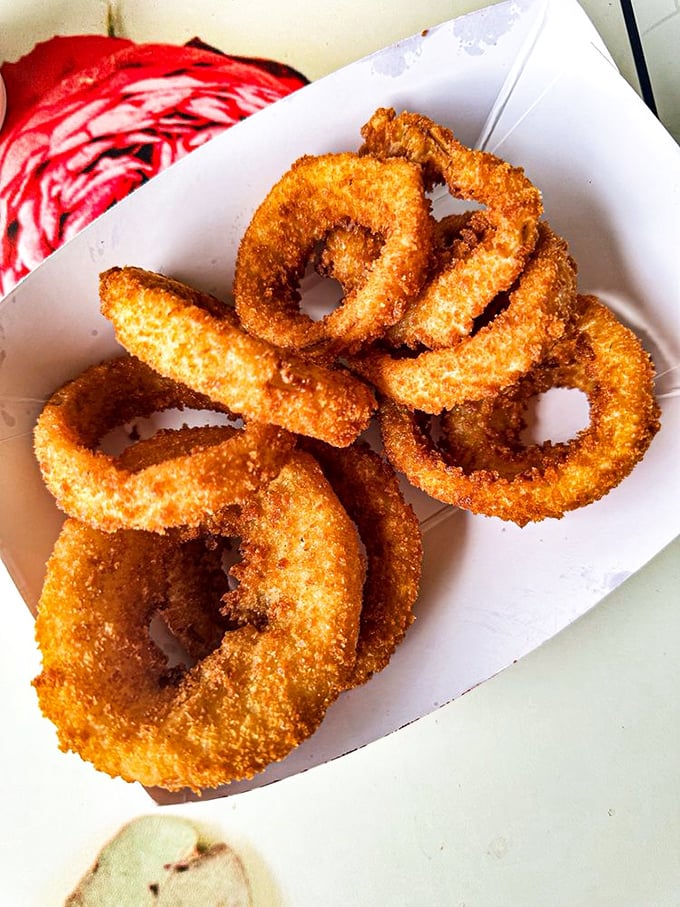 Perfect onion rings should shatter just so, revealing sweet onion beneath that crispy armor. These understood the assignment.