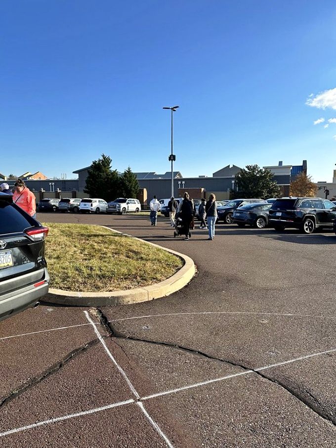 The parking lot fills with vehicles from across the region, their empty trunks soon to be stuffed with the day's conquests.