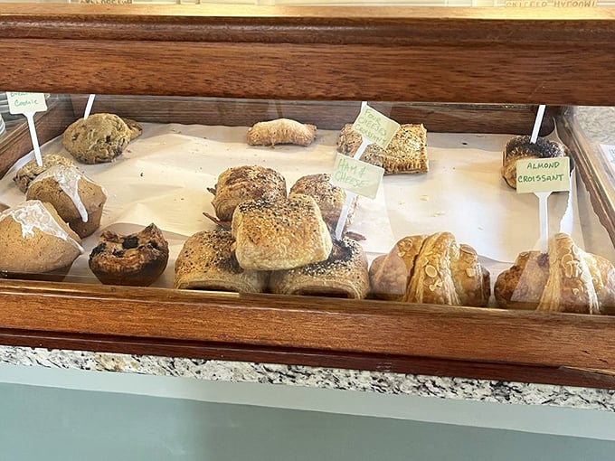 The pastry case: where willpower goes to die a delicious death and "I'll just have coffee" becomes "and one of those... and that one too."