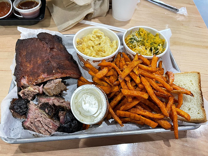The meat plate doesn't just feed you&mdash;it educates you on what's possible when smoke, time, and passion collaborate on a tray.