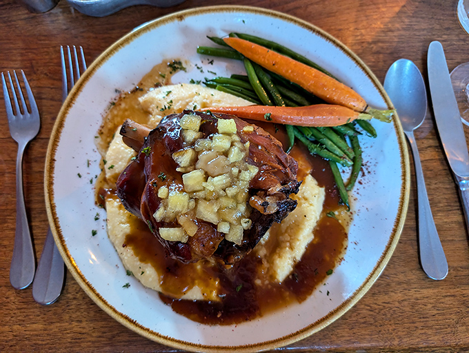This isn't just pot roast&mdash;it's a time-traveling flavor bomb served atop creamy mashed potatoes with vegetables that actually had a life before the plate.