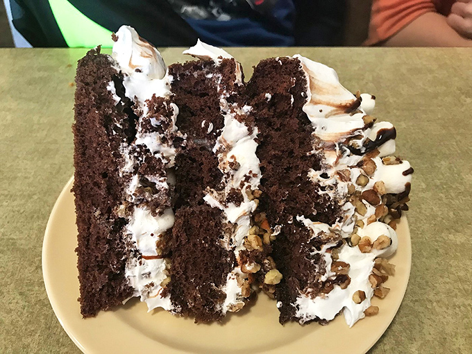 Layer upon layer of chocolate decadence&mdash;this cake doesn't just satisfy your sweet tooth, it throws a party for it complete with cream cheese frosting.