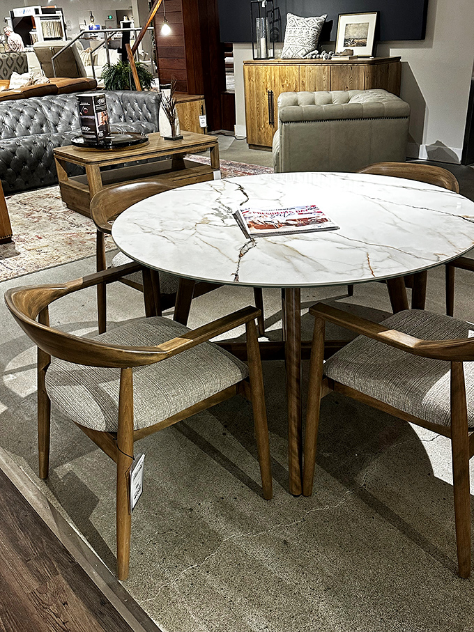 Mid-century modern meets marble in this dining set that makes everyday meals feel like special occasions. Those chairs curve in all the right places.