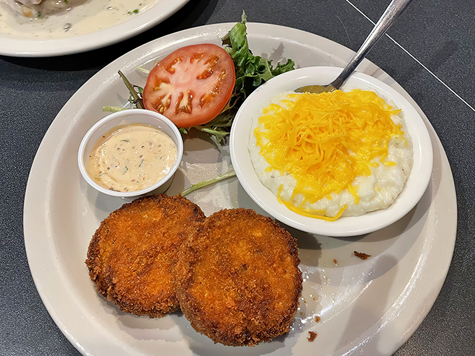 Crispy salmon croquettes beside cheesy grits make fish for breakfast feel like the smartest decision you'll make all day.