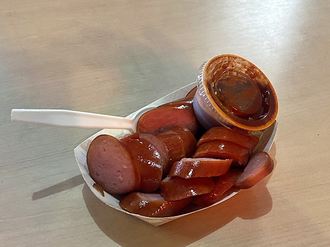Sausage that's been kissed by smoke and glazed with sauce. Simple, perfect, and exactly what you want alongside a cold drink.