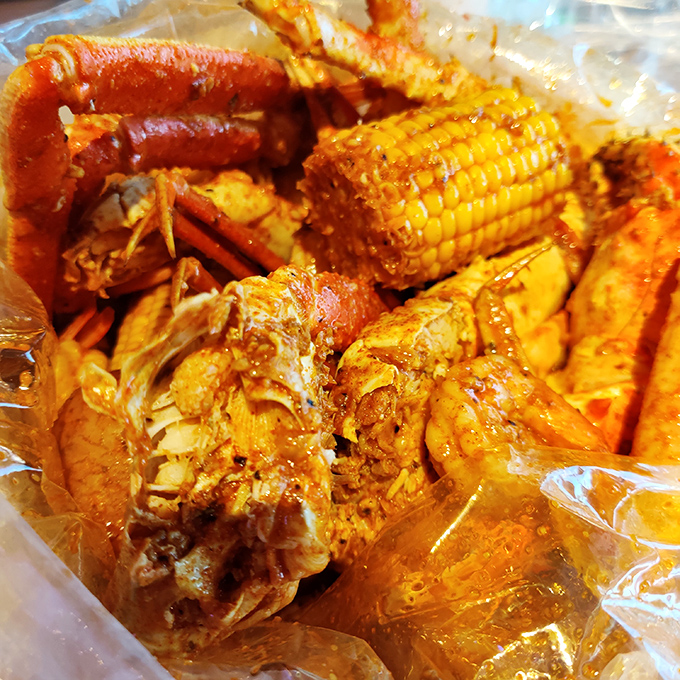 The seafood boil in all its steaming, seasoned splendor. This bag contains more treasure than anything pirates ever buried.