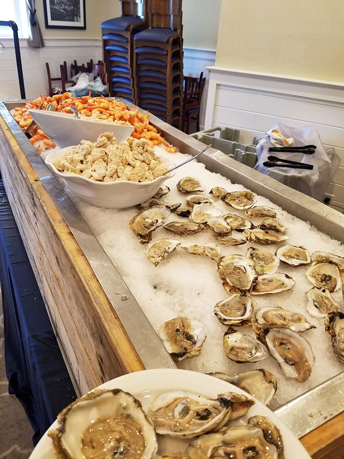 The raw bar display &ndash; where sea treasures rest on ice before their grand finale. Oysters waiting patiently for their lemon squeeze.