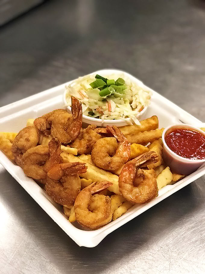Golden-fried shrimp that snap like tiny flavor grenades. This basket isn't just lunch; it's a coastal vacation that fits in your hand.