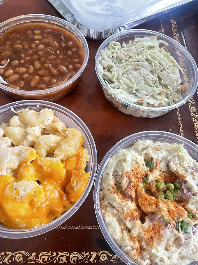 Side dishes that refuse to be afterthoughts. That mac and cheese is staging a delicious coup against the meat.