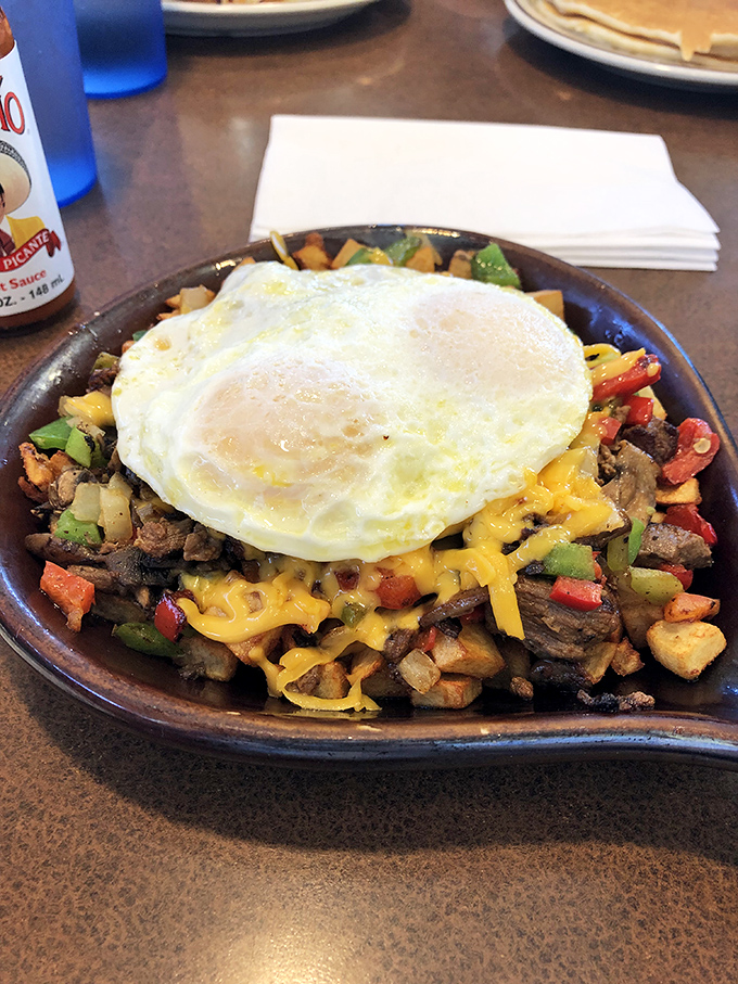 This skillet breakfast is what happens when ingredients have a party and everyone shows up&mdash;topped with an egg that's dressed for the occasion.