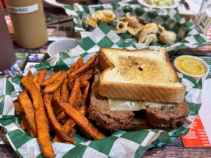 This sandwich isn't just lunch&mdash;it's architecture. Sweet potato fries on the side are the supporting cast to this smoky star. 