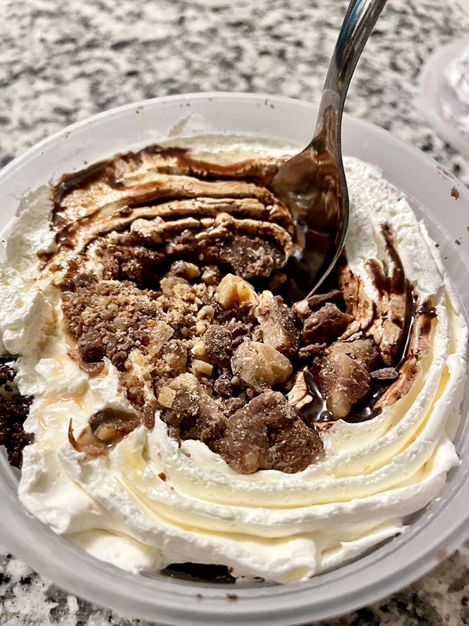 This isn't just ice cream&mdash;it's a glorious finale featuring what appears to be chocolate and cookie crumbles doing their best to upstage the main course.