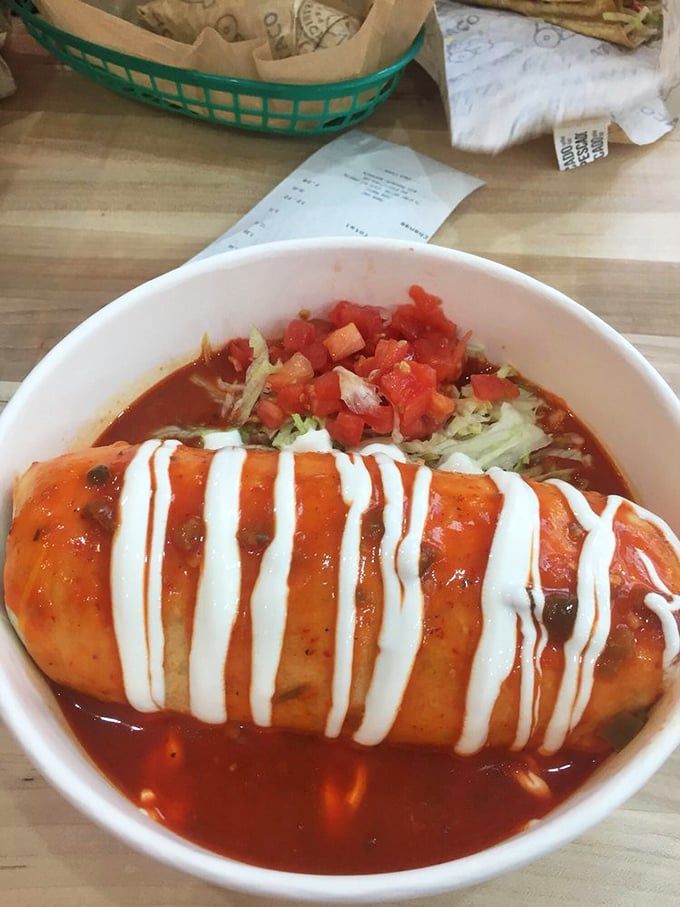 The smothered burrito&mdash;like a regular burrito that went to finishing school and came back wearing a delicious sauce tuxedo. 