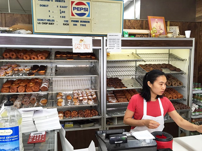 Where the magic happens &ndash; skilled hands working with the efficiency that comes only from years of crafting the perfect donut.