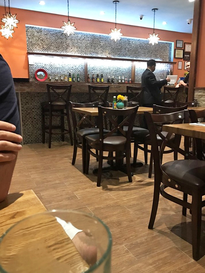 Where magic happens: the dining area combines warm lighting, comfortable seating, and the promise of flavors that transport you south of the border.