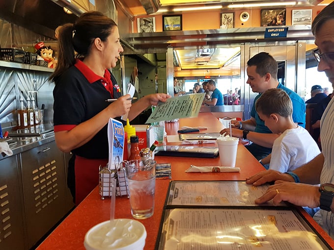 Service with a smile and menu knowledge to match. The staff here doesn't just take orders&mdash;they're ambassadors to the golden age of roadside dining.