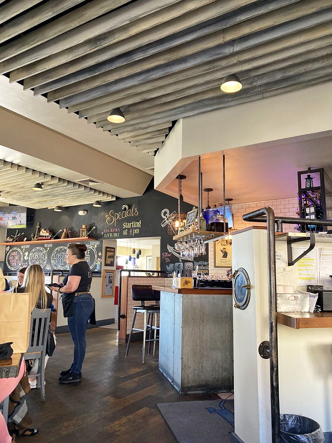 Chalkboard specials announce the day's freshest catches. In a world of digital menus, there's something wonderfully authentic about handwritten offerings.