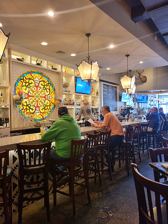 The beautiful stained glass anchors the bar area with vintage charm. Even while waiting for a table, you're treated to eye candy as impressive as the menu.