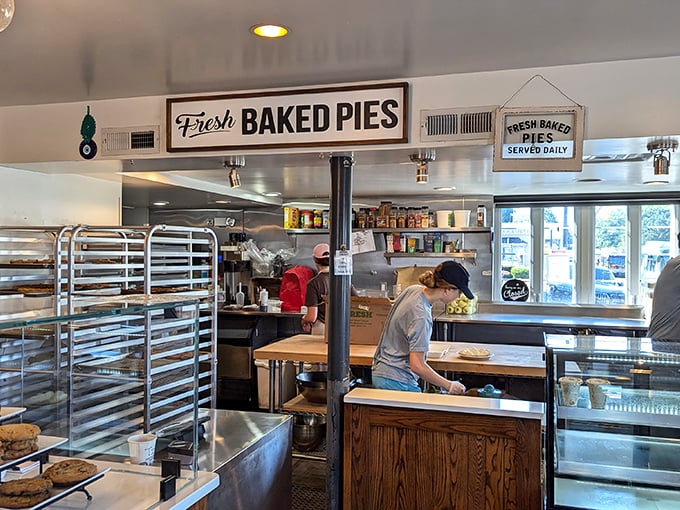 Where the magic happens&mdash;bakers crafting tomorrow's memories under a sign that states their delicious mission with perfect clarity.