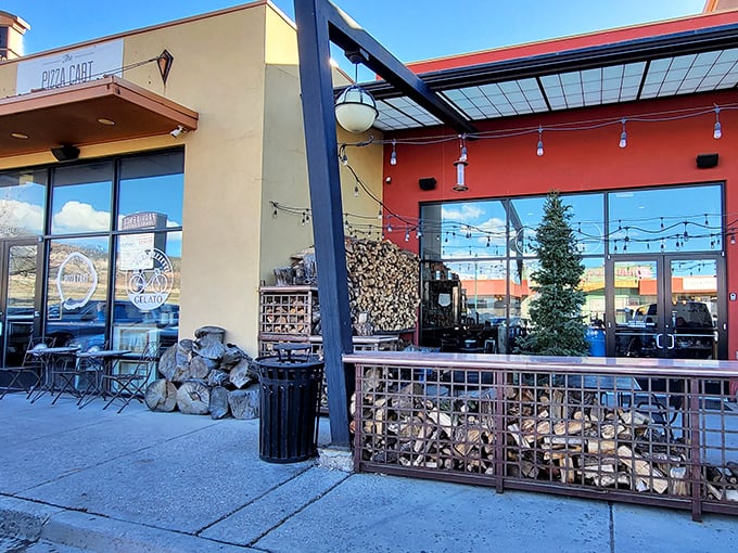 The Pizza Cart's rustic outdoor seating area invites you to rest your antiquing-weary feet while debating which shop deserves a second visit.