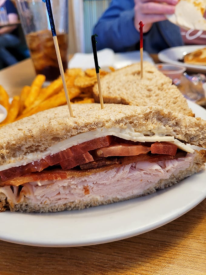 The Rachel sandwich&mdash;turkey's answer to the Reuben&mdash;stacked tall enough to require those toothpick supports that double as victory flags for your hunger.