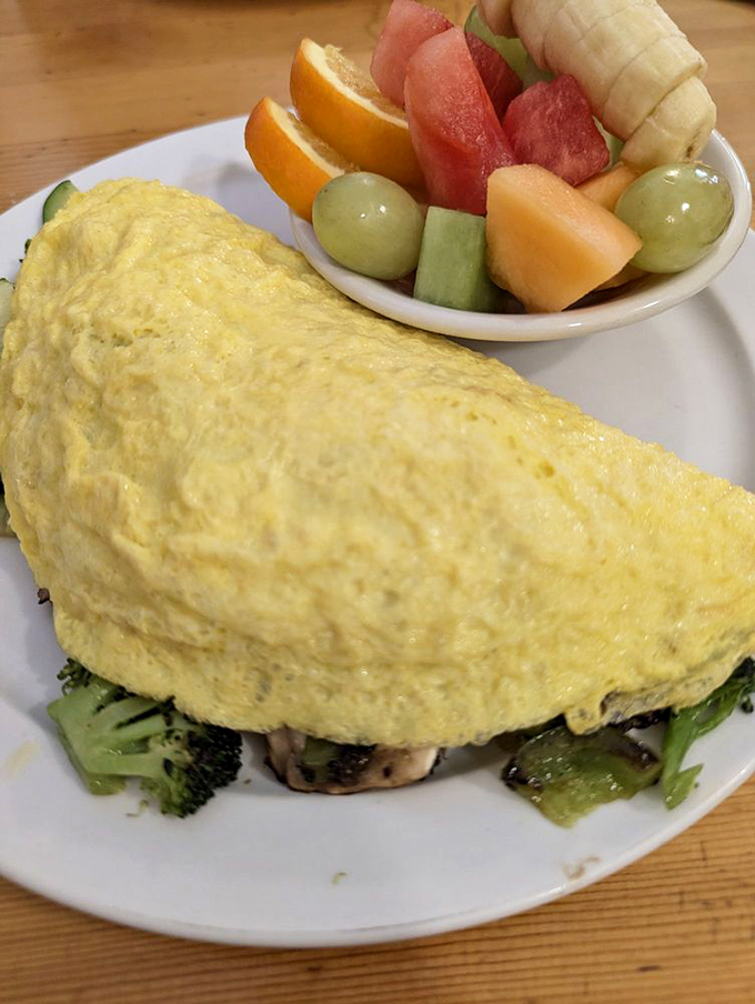 This vegetable omelet wrapped around broccoli and mushrooms is so perfectly executed, even carnivores might experience a moment of plant-based envy.