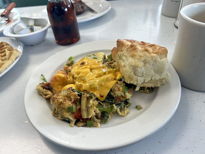 This veggie omelet with biscuit isn't trying to win any beauty contests&mdash;it's too busy delivering pure, unfussy satisfaction to worry about such things.