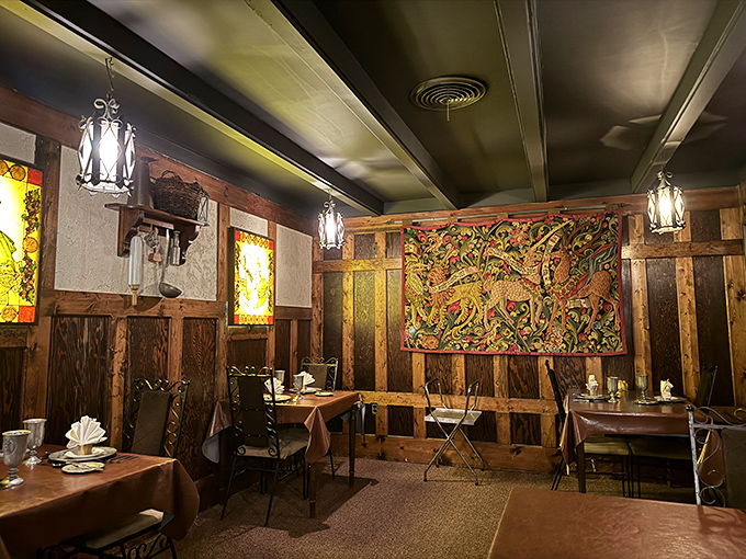The dining room walls feature tapestries and wood paneling that make you feel like you should be discussing matters of the realm rather than whether to order dessert.
