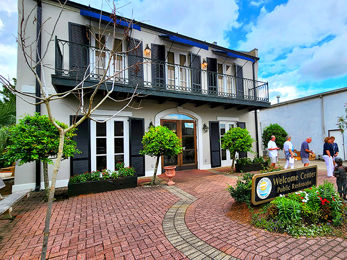 Fairhope's Welcome Center, with its classic architecture and manicured grounds, sets the tone: "We take hospitality seriously, but never ourselves."