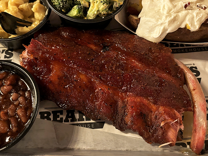 These ribs don't just fall off the bone – they practically leap into your mouth, trailing a wake of smoky perfection and sticky-sweet sauce.