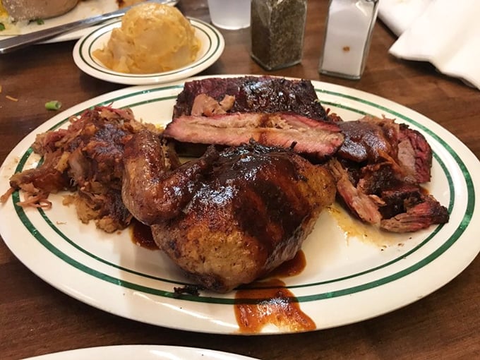 The sampler plate that ruins all future barbecue experiences. Chicken, ribs, and brisket having a party that your taste buds crashed.