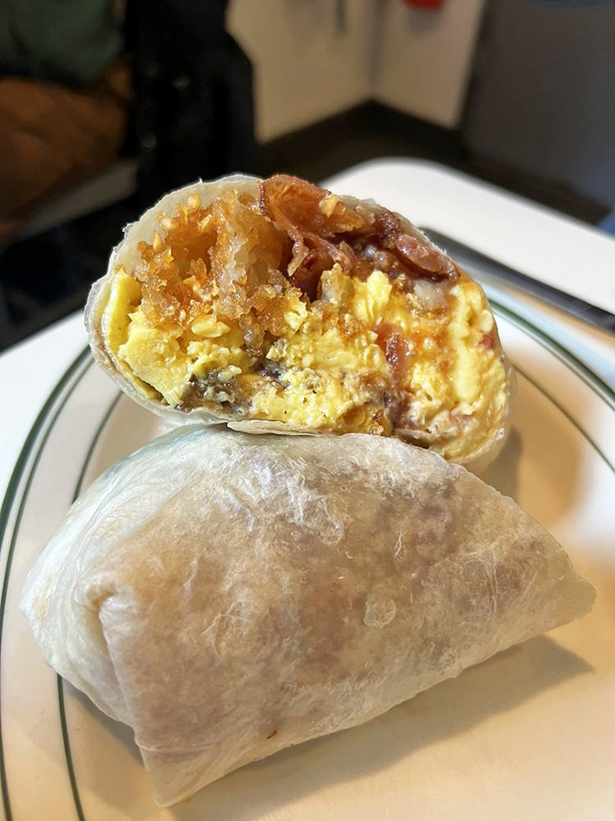 Breakfast burrito perfection&mdash;a handheld miracle where eggs, meat, and cheese find their higher purpose wrapped in a warm tortilla blanket.