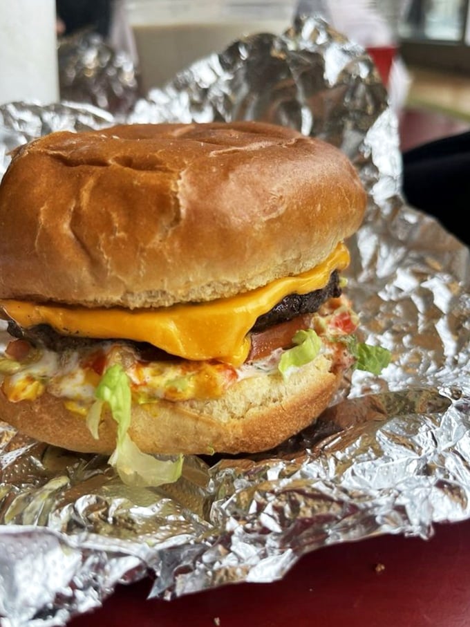 This burger isn't just food&mdash;it's architecture. The careful layering of ingredients creates the structural integrity needed for maximum flavor delivery.