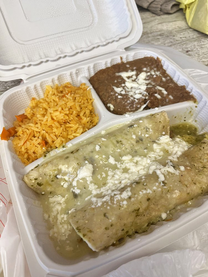 This takeout container doesn't just hold food&mdash;it cradles dreams. That green sauce is doing things that should probably require some kind of license.