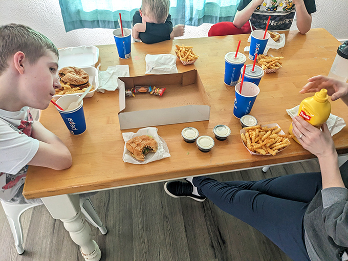 Family dinner done right&mdash;where conversations happen face-to-face and the biggest decision is whether to share fries or order more.