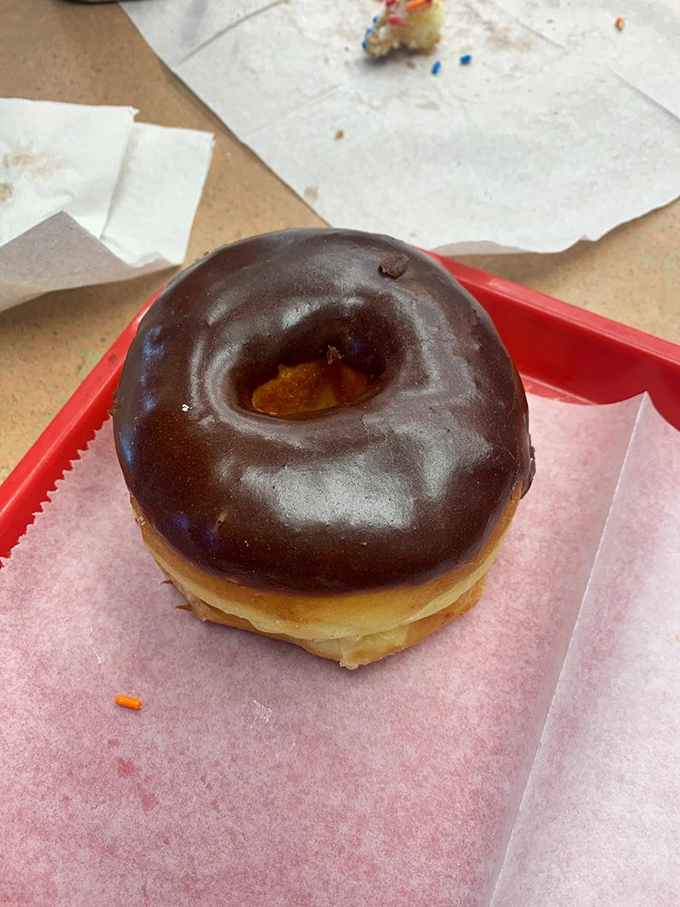 The chocolate glazed donut: proof that simplicity, when executed perfectly, needs no embellishment. The little black dress of the pastry world.