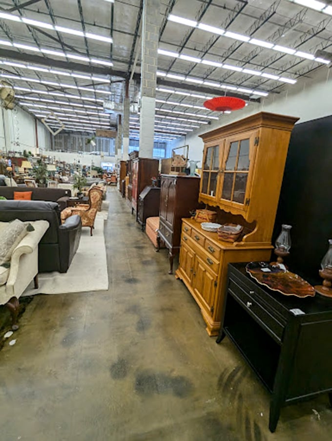 Wood cabinets and dressers create boulevards of browsing possibilities, each piece patiently waiting for someone to say, "That's coming home with me!"