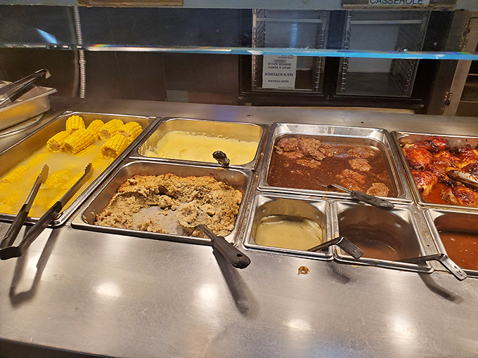 Corn on the cob alongside classic casseroles&mdash;a lineup that would make any potluck organizer green with envy.