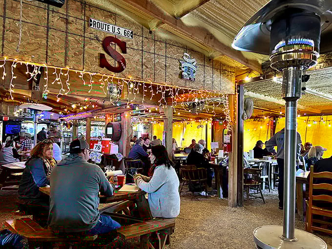 Where strangers become neighbors over shared tables and chicken-induced smiles. The dining room buzzes with the universal language of "mmm."