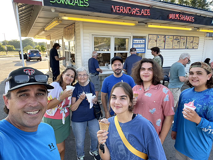 The true measure of an ice cream shop: multi-generational families gathering outside, united by the universal language of frozen custard.