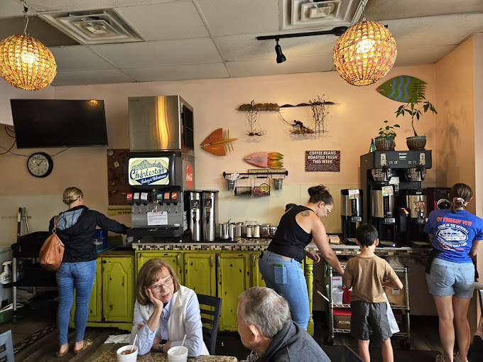The coffee counter&mdash;where morning grumpiness goes to die. Those yellow cabinets aren't just storage; they're sunshine in furniture form.