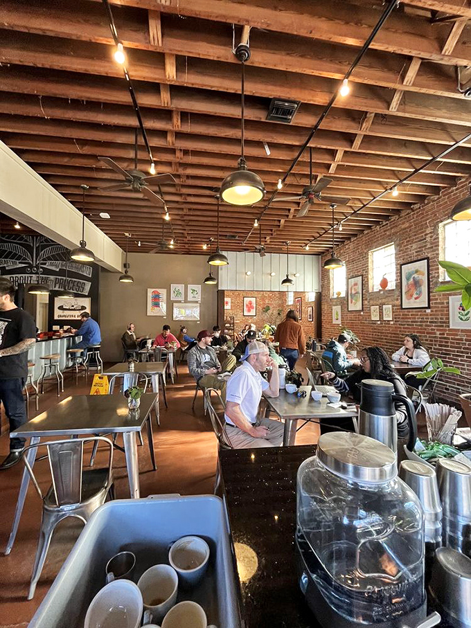 The daily symphony of Bold Bean&mdash;locals and visitors alike finding their rhythm in this brick-walled haven of caffeinated contentment.