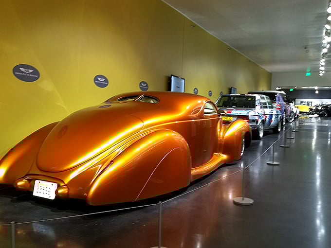 This golden custom Willys isn't subtle, but neither was America in the 1940s. Hot rod culture transformed practical transportation into rolling art.