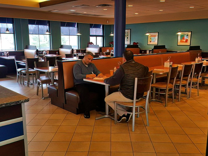 Comfortable booths where countless life decisions have been made over bottomless cups of coffee and friendly advice.