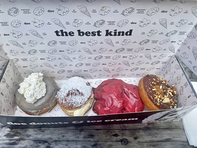 The display case offers a museum-worthy collection where each shelf presents a different exhibit in the gallery of "Things Worth Breaking Your Diet For."