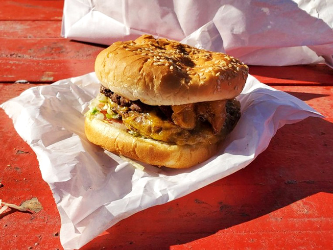 This sesame-seeded masterpiece isn't just a double cheeseburger; it's a monument to the art of American comfort food. 