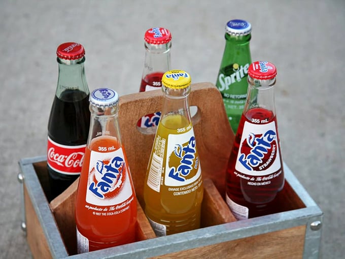 The international language of refreshment. These colorful bottles are the perfect companions to cut through the richness of Greek cuisine.