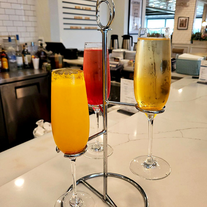A mimosa flight that proves breakfast cocktails deserve the same attention as the food &ndash; sunshine in glassware ready to brighten your morning.